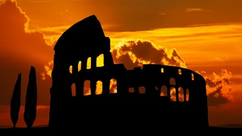 Rome: Colosseum at sunset with Red Sun a... | Stock Video | Pond5