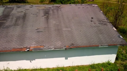 Roof missing shingles due to age, weathe... | Stock Video | Pond5