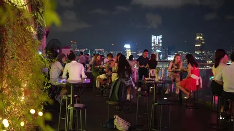 Roof top bar with night view of Victoria... | Stock Video | Pond5
