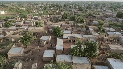 Rooftops of a sprawling town in Burkina ... | Stock Video | Pond5