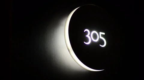 A room number sign for room 305 in a mod... | Stock Video | Pond5