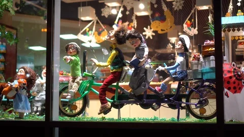 ROSHEN store . The moving dolls in a sto... | Stock Video | Pond5