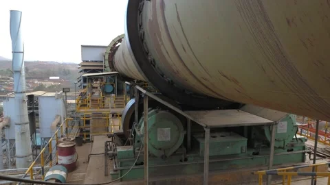 Rotary kiln equipment in operation at a ... | Stock Video | Pond5