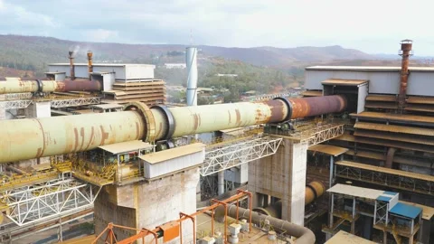 Rotary kiln equipment in operation at a ... | Stock Video | Pond5