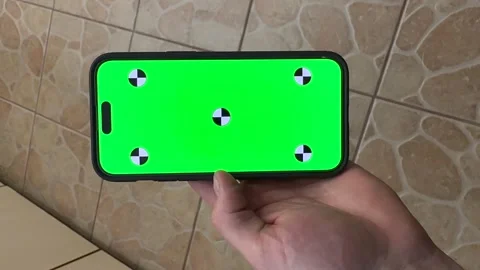 Rotate phone with green screen with one ... | Stock Video | Pond5
