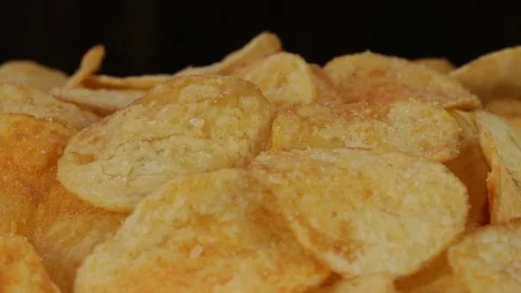 Rotates potato chips , macro view food b... | Stock Video | Pond5