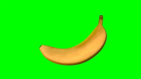 rotating banana on green background | Stock Video | Pond5