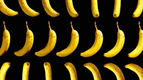 Rotating bananas floating on a backgroun... | Stock Video | Pond5