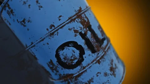 Rotating Barrel with Overflowing Oil | Stock Video | Pond5