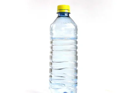 Rotating bottle of water isolated on a w... | Stock Video | Pond5