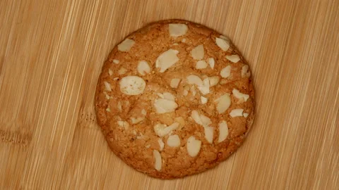 Rotating Brown Cookie With Almond Nut On... | Stock Video | Pond5