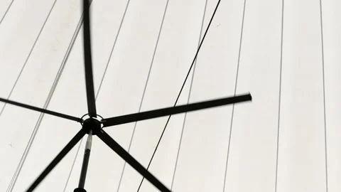 rotating ceiling fan for building air ci... | Stock Video | Pond5