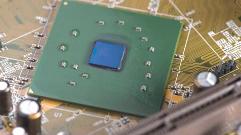 Rotating CPU core on motherboard. Centra... | Stock Video | Pond5