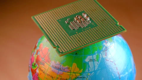 Rotating CPU on top of a world globe aga... | Stock Video | Pond5