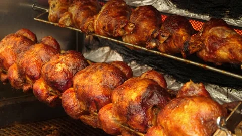 Rotating delicious grilled chicken and t... | Stock Video | Pond5