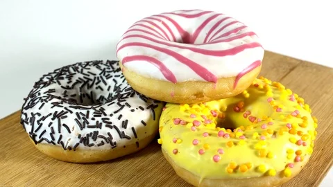 Rotating donuts with different fillings ... | Stock Video | Pond5