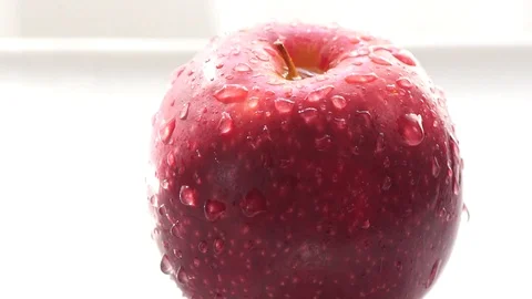 A rotating fresh red apple fruit for hea... | Stock Video | Pond5