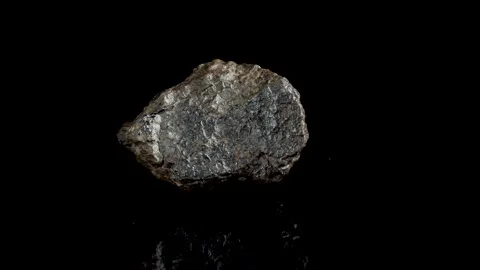 Rotating Of An Iron Meteorite. black bac... | Stock Video | Pond5