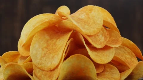 Rotating potato chips close up, macro vi... | Stock Video | Pond5