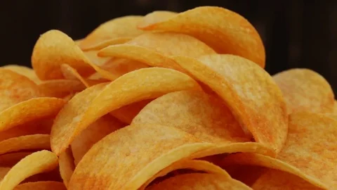 Rotating potato chips , macro view food ... | Stock Video | Pond5