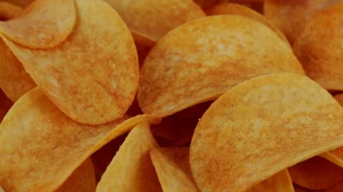Rotating potato chips , macro view food ... | Stock Video | Pond5