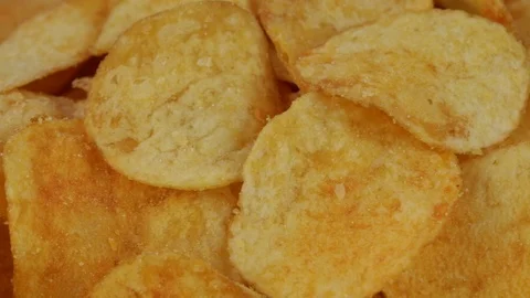 Rotating potato chips , macro view food ... | Stock Video | Pond5