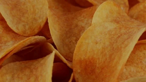 Rotating potato chips , macro view food... | Stock Video | Pond5