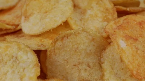 Rotating potato chips , macro view food ... | Stock Video | Pond5