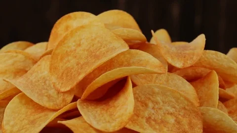 Rotating potato chips , macro view food ... | Stock Video | Pond5