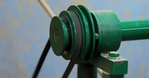 Rotating pulley with rubber belt of a la... | Stock Video | Pond5