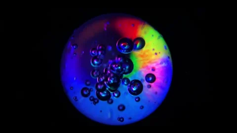 rotating rainbow sphere with air bubbles... | Stock Video | Pond5