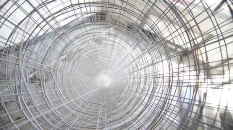 Rotating roll of metal grid in unfinishe... | Stock Video | Pond5