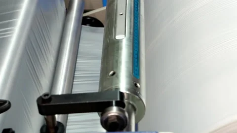 Rotating rolls with wound polyethylene f... | Stock Video | Pond5