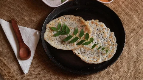 rotating Set Dosa is a 'set' of 2 dosas... | Stock Video | Pond5