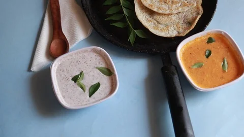 rotating Set Dosa is a 'set' of 2 dosas... | Stock Video | Pond5