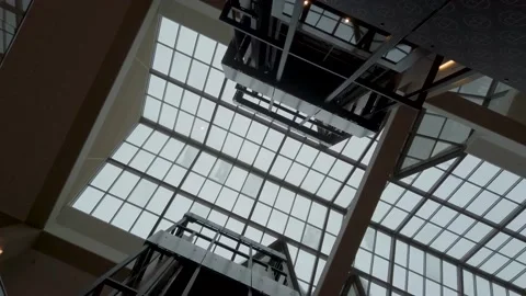 Rotating shot looking up between two gla... | Stock Video | Pond5