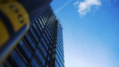 Rotating shot looking up towards high ri... | Stock Video | Pond5