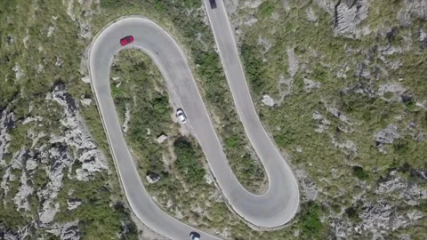 Rotating top view of a curved rural road... | Stock Video | Pond5