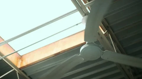 Rotation of ceiling fan. Fast moving fan... | Stock Video | Pond5