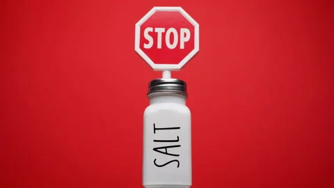 Rotation of a salt shaker with stop sign... | Stock Video | Pond5