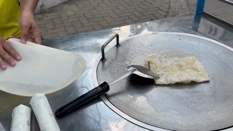 Roti making, crispy roti dessert of Thai... | Stock Video | Pond5
