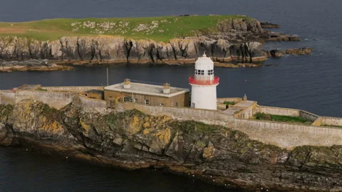 Rotten island lighthouse Ireland Aerial ... | Stock Video | Pond5