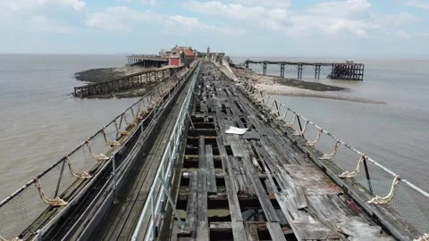 Rotting disused pier near to collapse. D... | Stock Video | Pond5