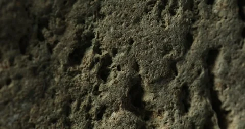 Rough Stone Surface with Natural Pitting... | Stock Video | Pond5