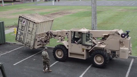 Rough terrain container handler at US Ar... | Stock Video | Pond5