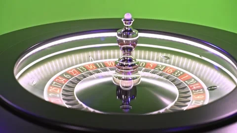 Roulette wheel spinning on green screen ... | Stock Video | Pond5