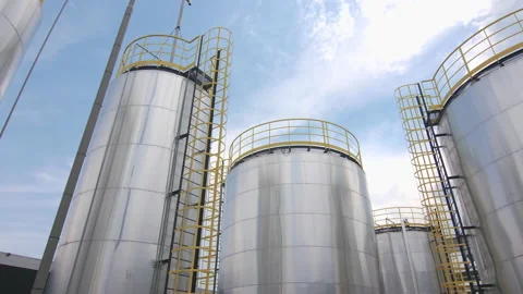 Round tanks of steel with ladders at car... | Stock Video | Pond5