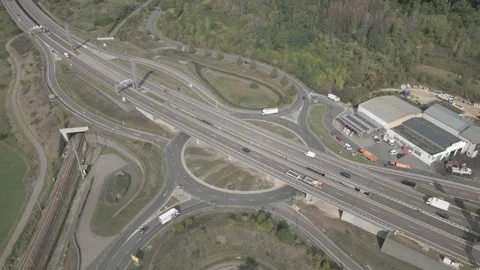 Roundabout with highway overpass | Stock Video | Pond5
