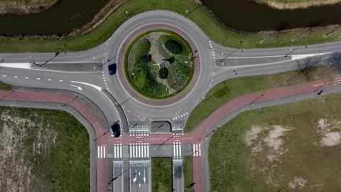Roundabout at the intersection of two as... | Stock Video | Pond5