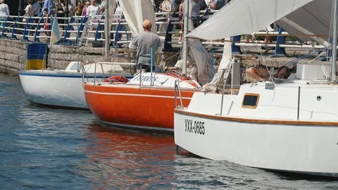 row of boats standing in the water and w... | Stock Video | Pond5